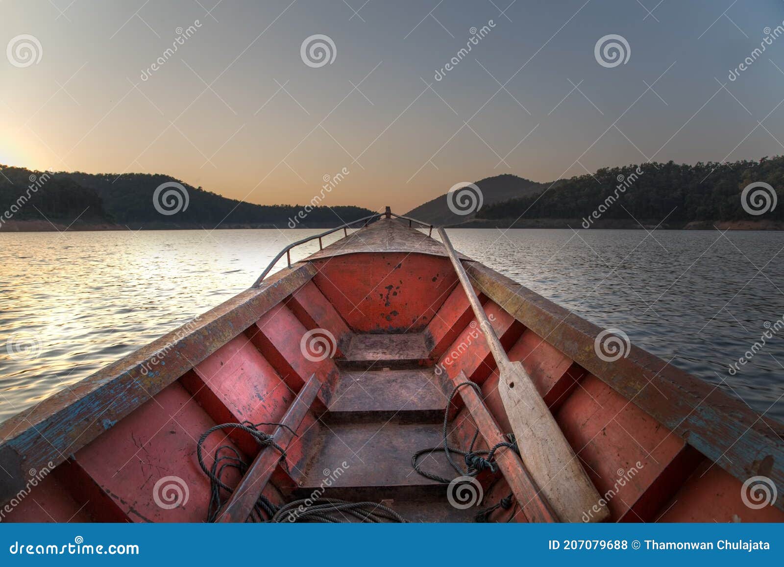 Prow boat on lake stock photo. Image of mountain, sunset - 207079688