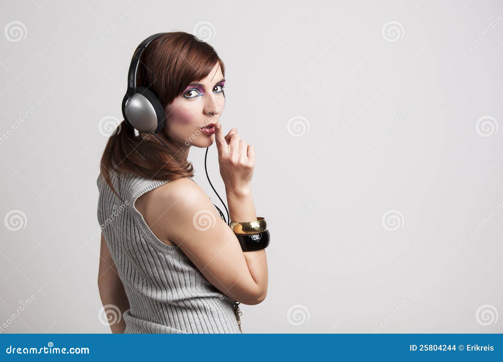 Psssssst, I m listen music stock photo. Image of pretty - 25804244