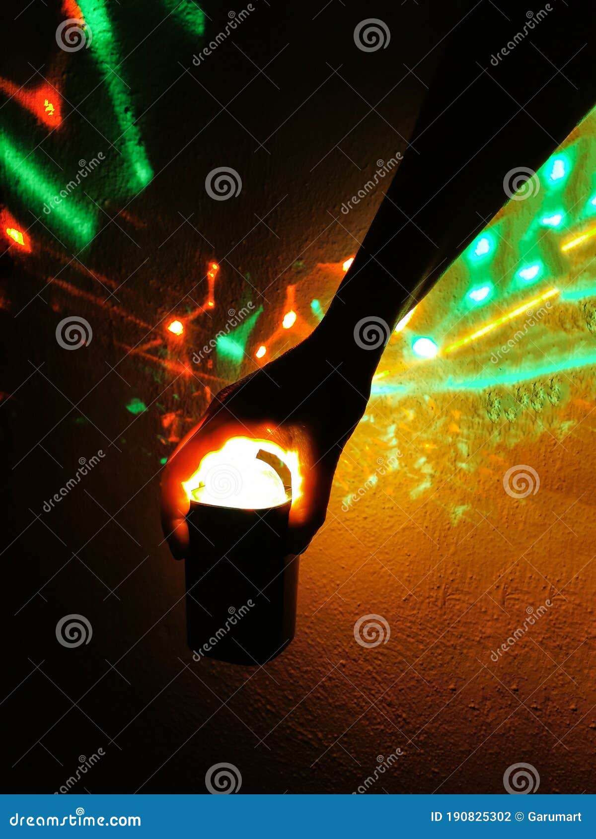 Psychedelic Colored Lights on Wall and Human Hand Stock Photo - Image ...
