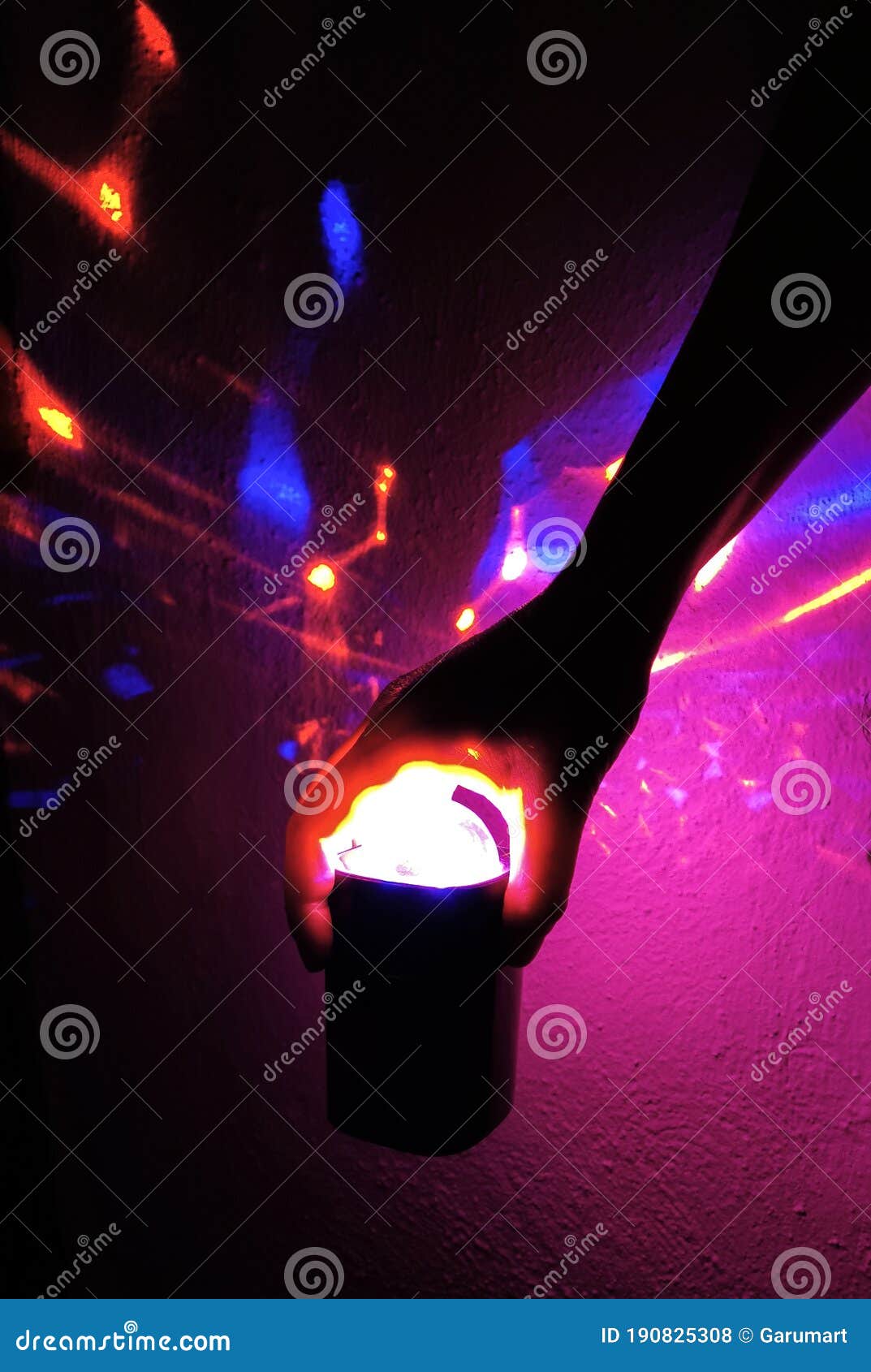 Psychedelic Colored Lights on Wall and Human Hand Stock Photo - Image ...