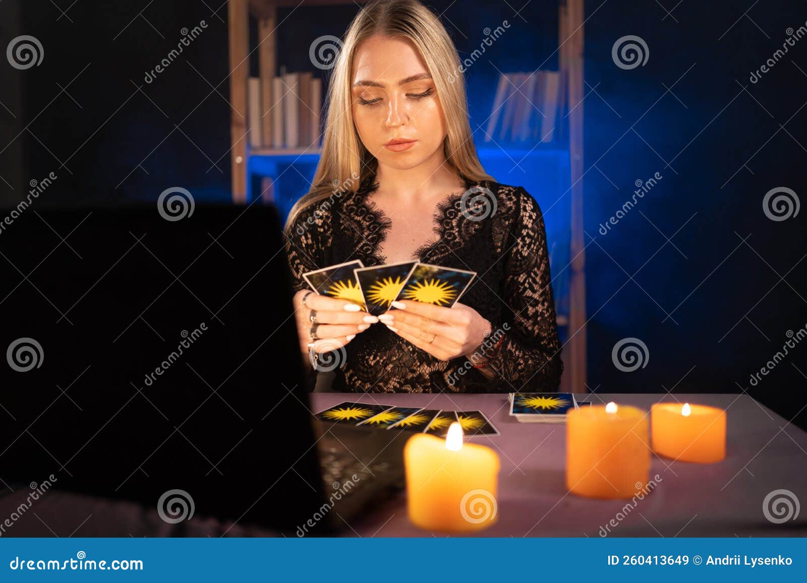 Psychic Tarot Card Reader on Laptop Computer while Having an Online ...