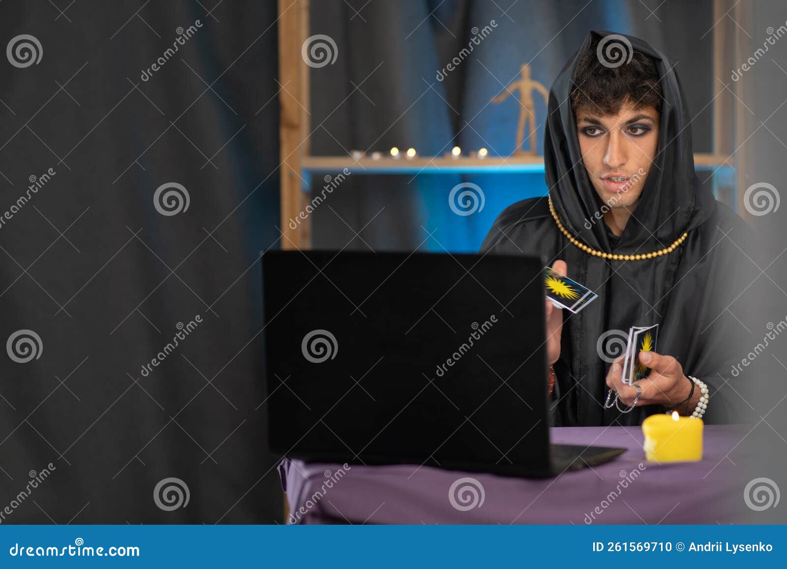 Psychic Tarot Card Reader on Laptop Computer while Having an Online ...