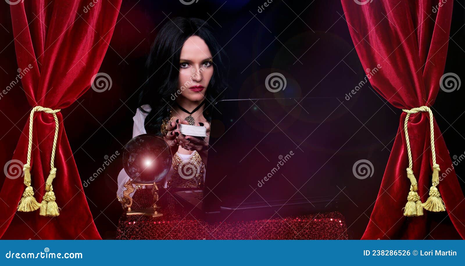 Psychic Tarot Card Reader on Laptop Computer with Crystal Ball Stock ...