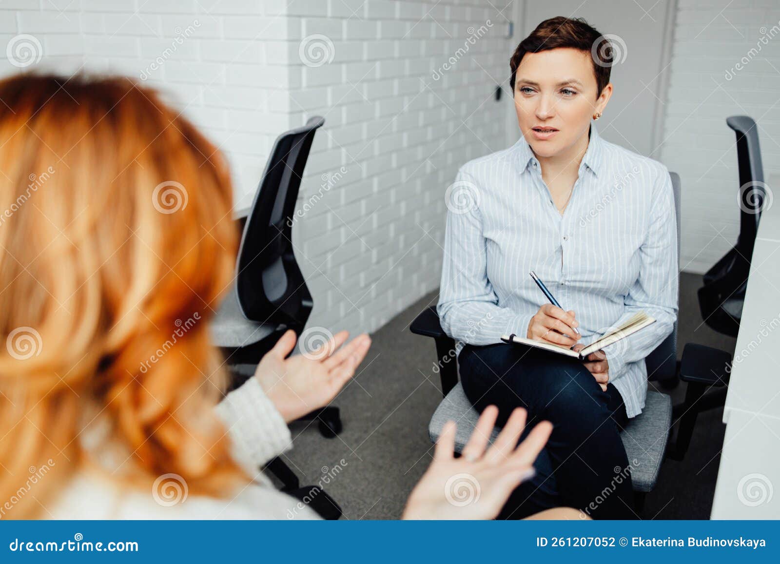 A Psychologist Meets with a Client in the Office Stock Photo - Image of ...