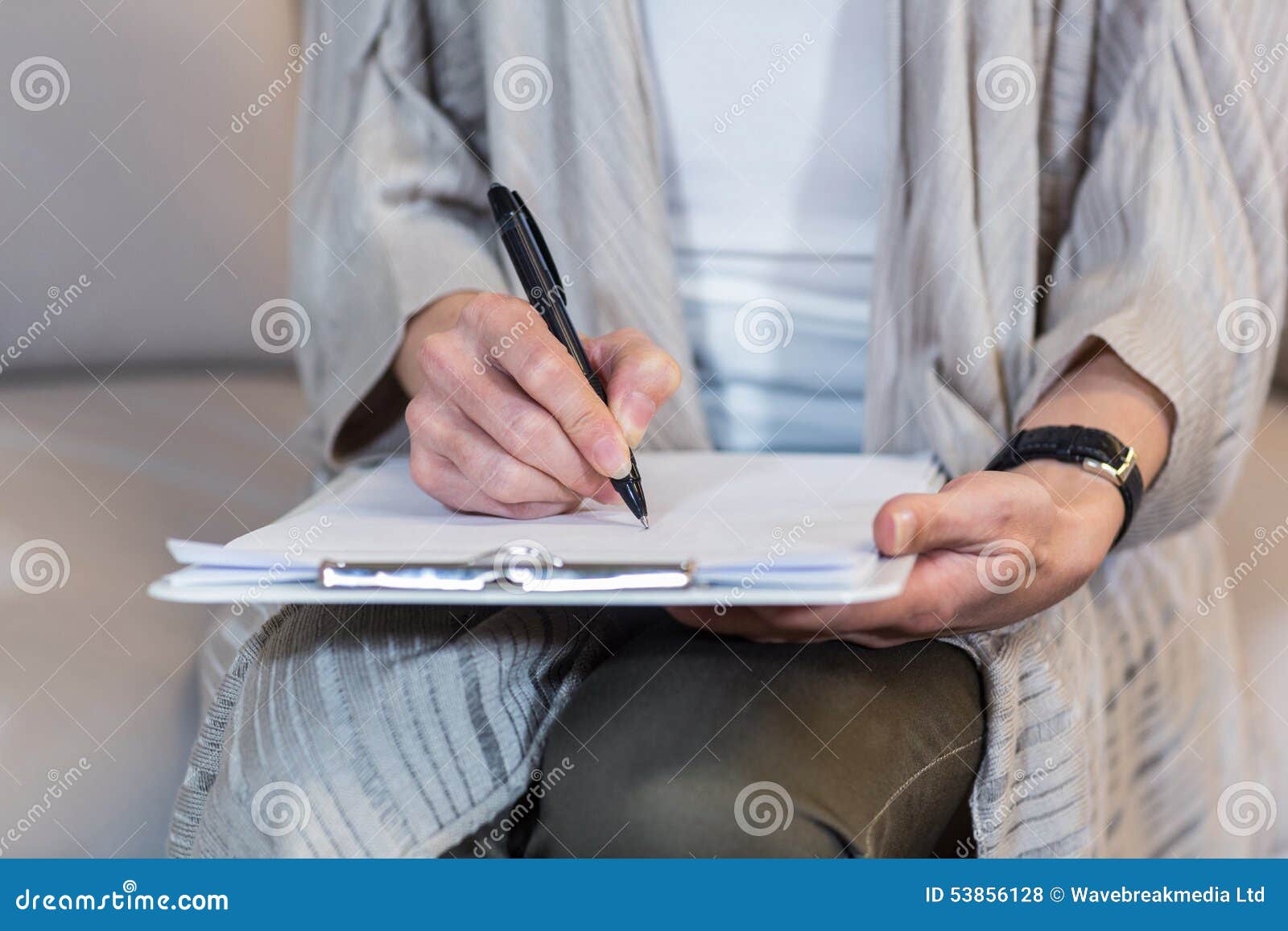 Psychologist Sitting on the Couch and Taking Notes Stock Photo - Image ...