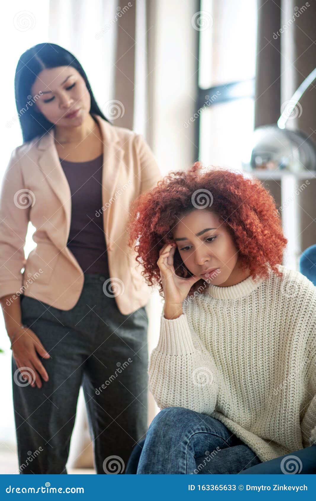 Dark-haired Mature Psychologist Supporting Her Crying Client Stock ...