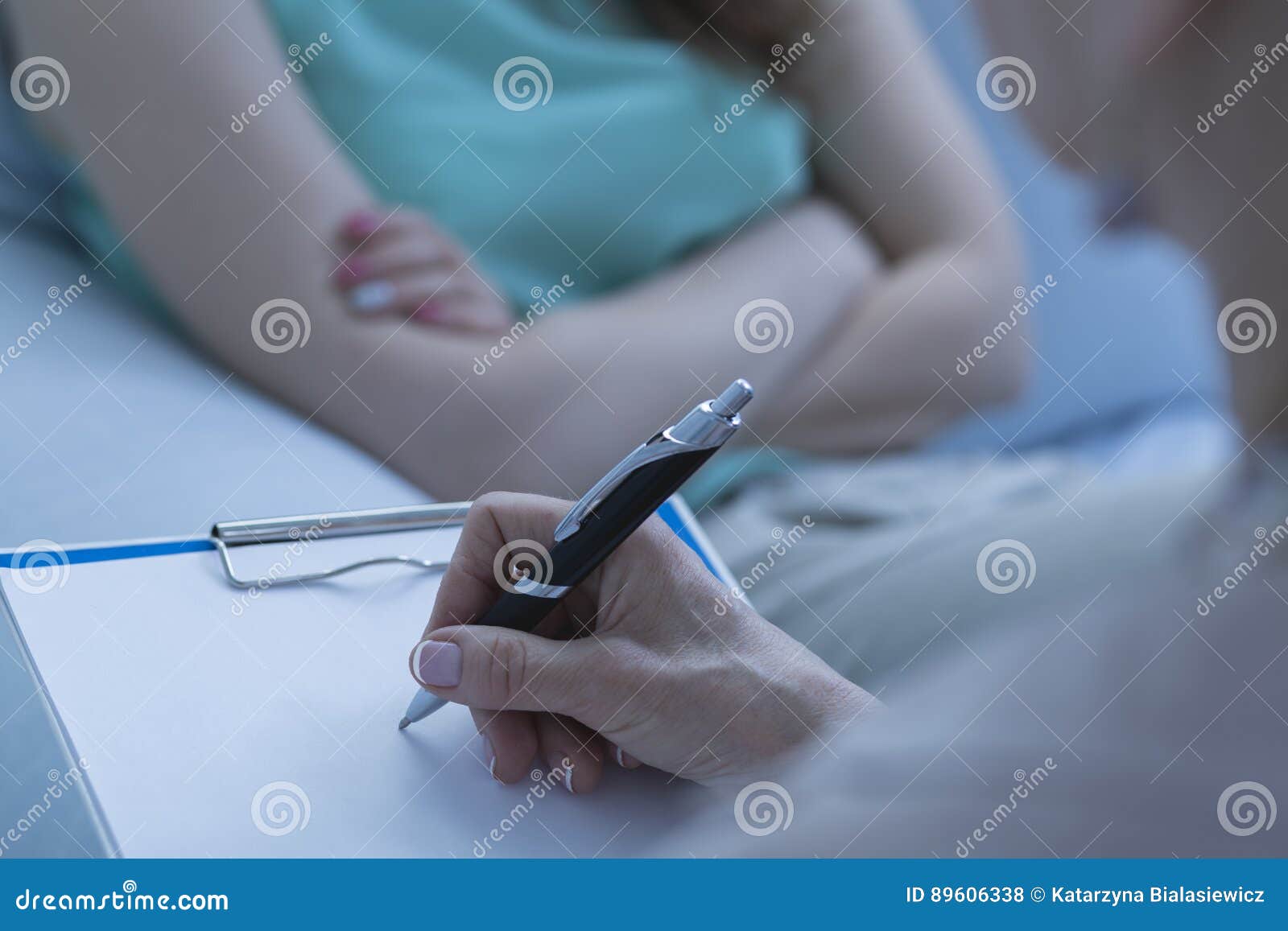 Psychologist Taking Notes during Session Stock Photo - Image of notes ...