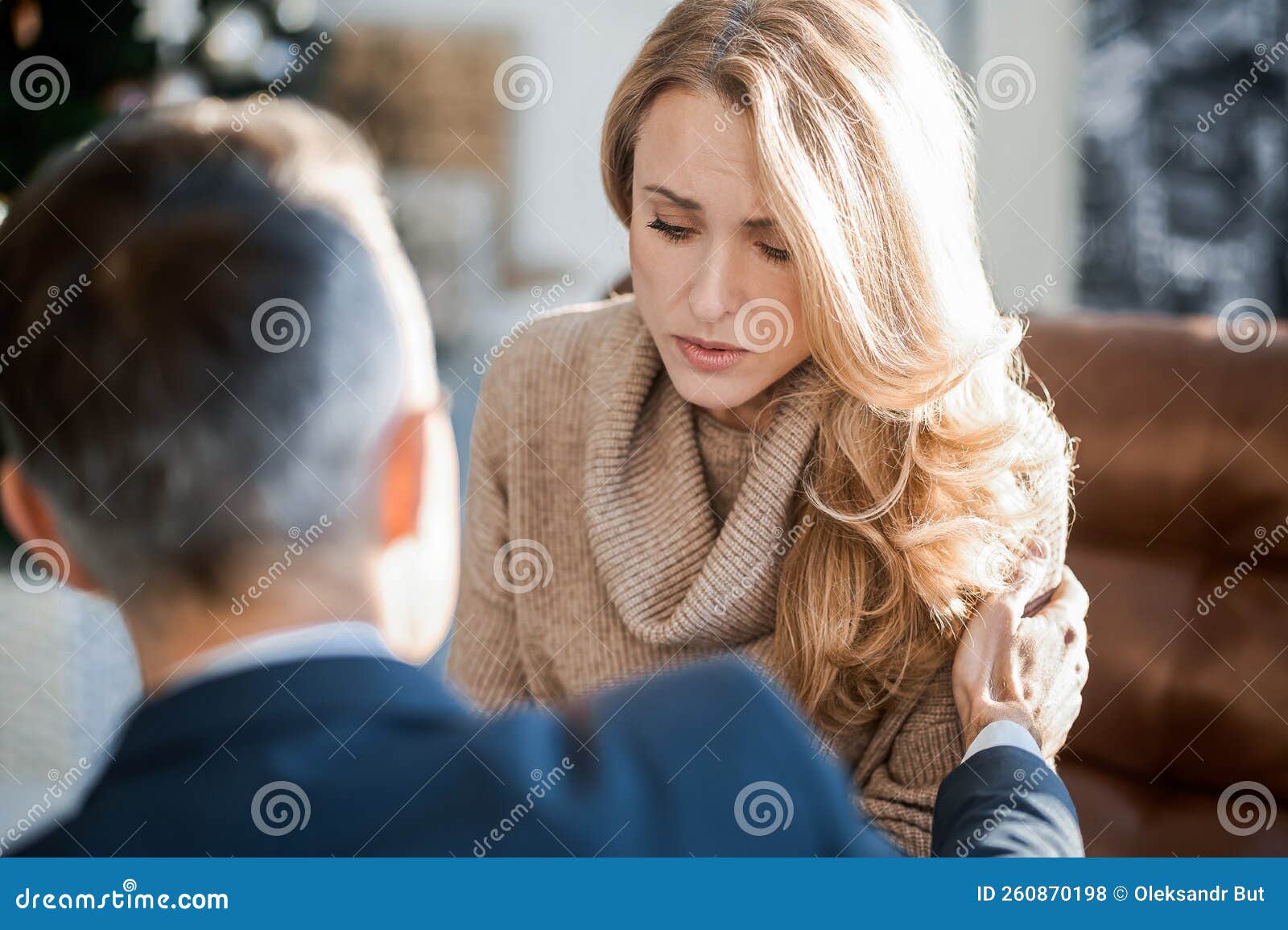 Psychologist Talking To a Client and Looking Friendly Stock Photo ...