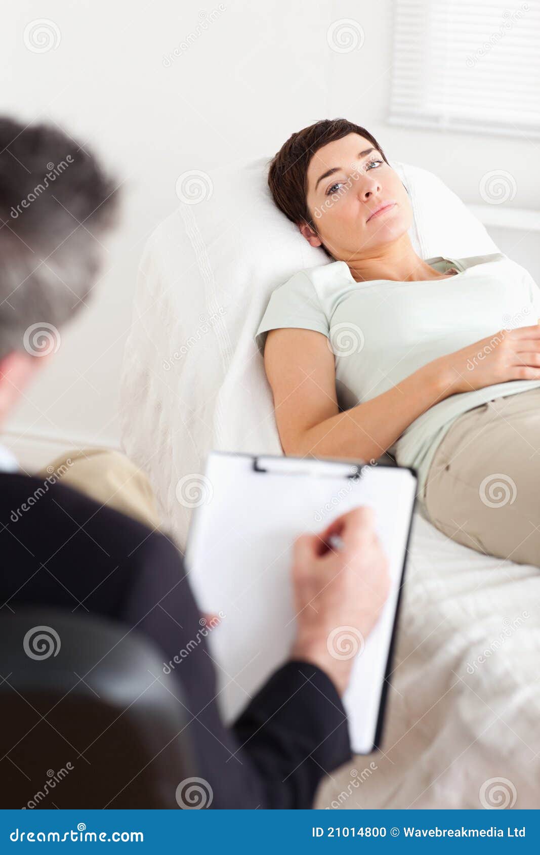 Psychologist Talking To a Sad Female Patient Stock Photo - Image of ...