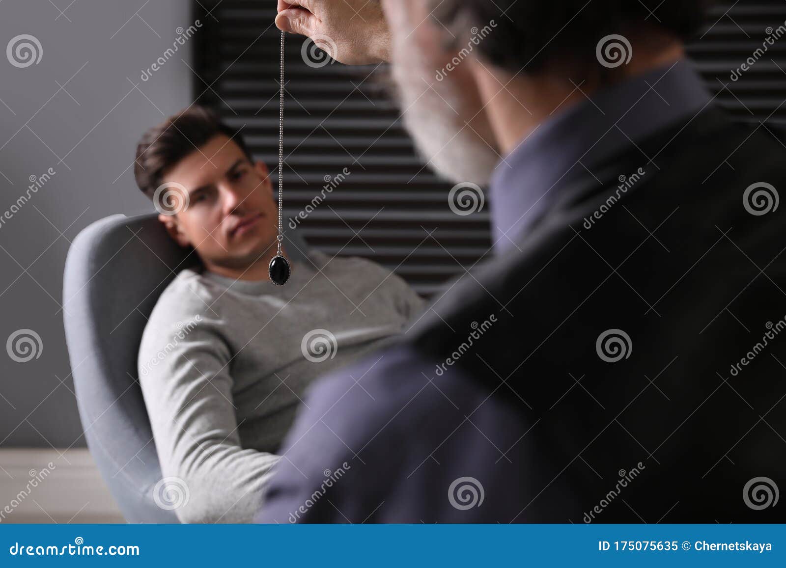 Psychotherapist Using Pendulum during Hypnotherapy Session Stock Image ...