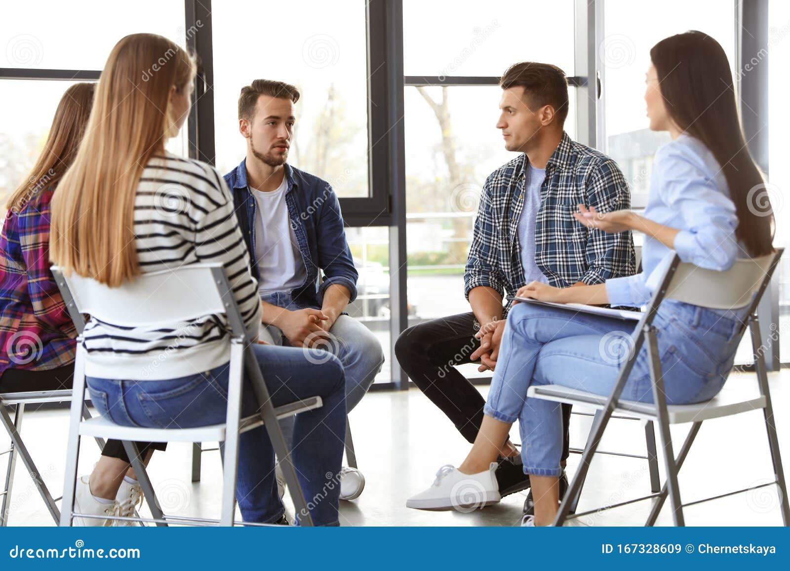 Psychotherapist Working with Patients in Group Therapy Session Stock ...