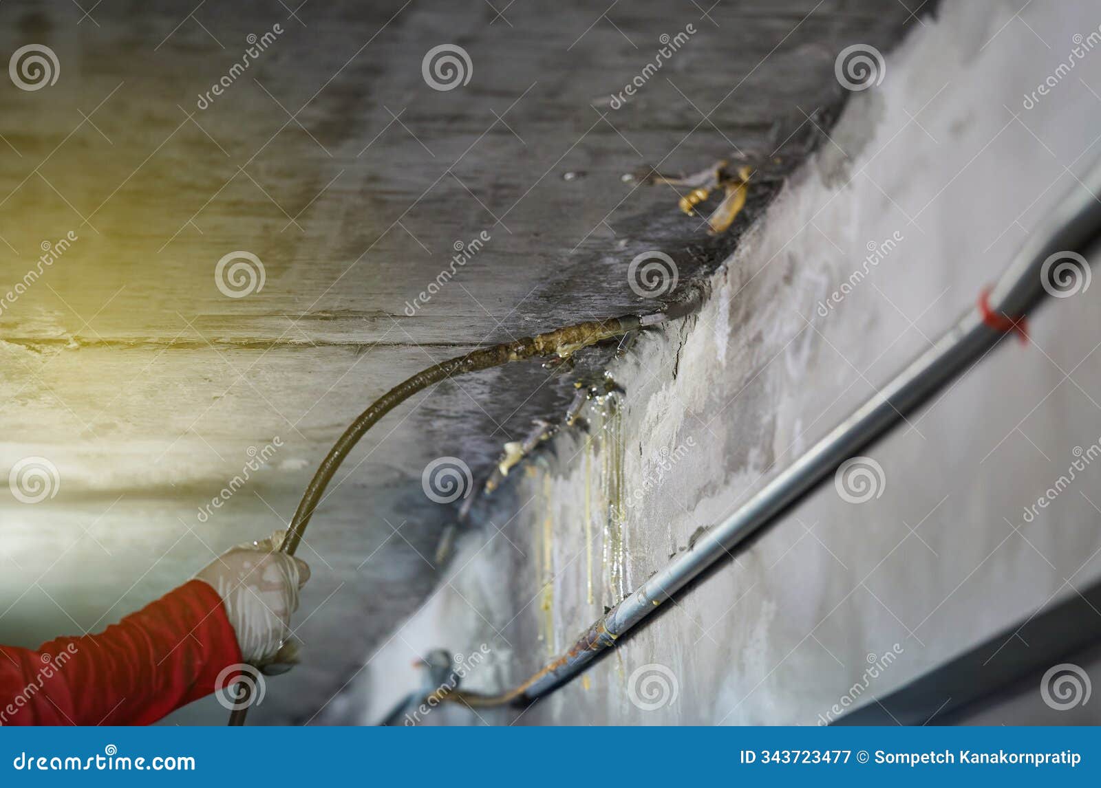 PU Foam Injections For Fixed Water Leakage Under Concrete Floor. Stock ...