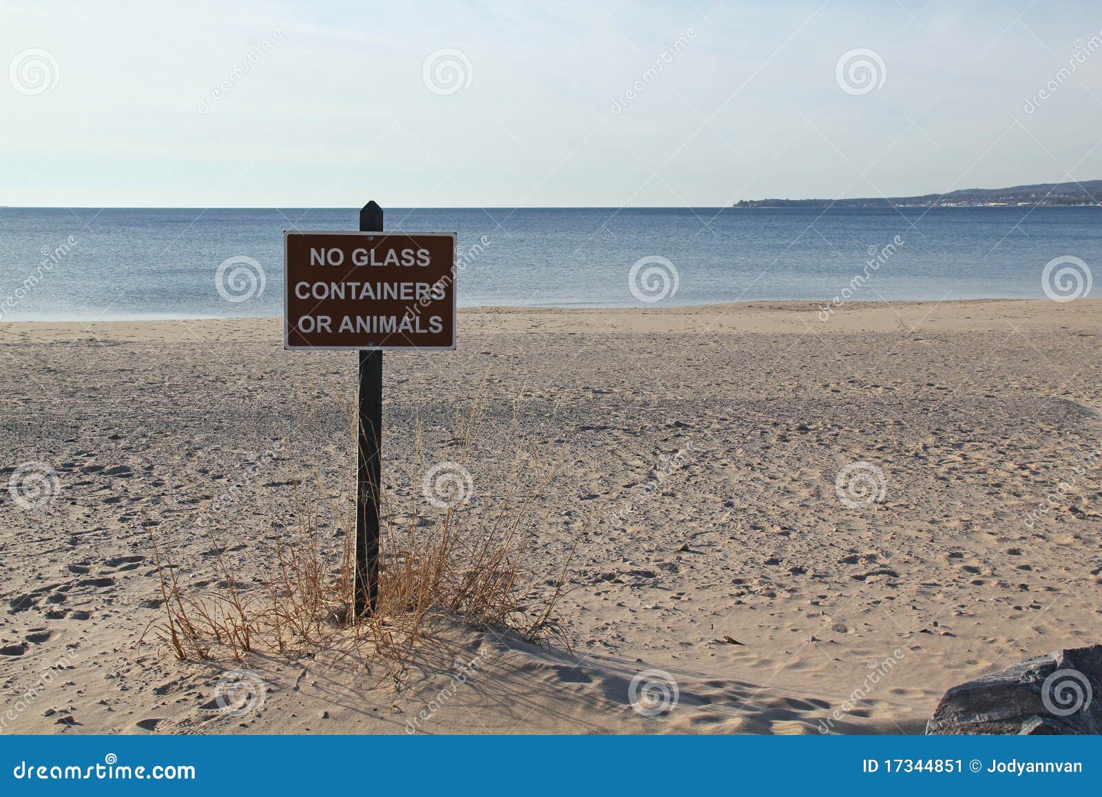 Public beach sign stock image. Image of clouds, land - 17344851