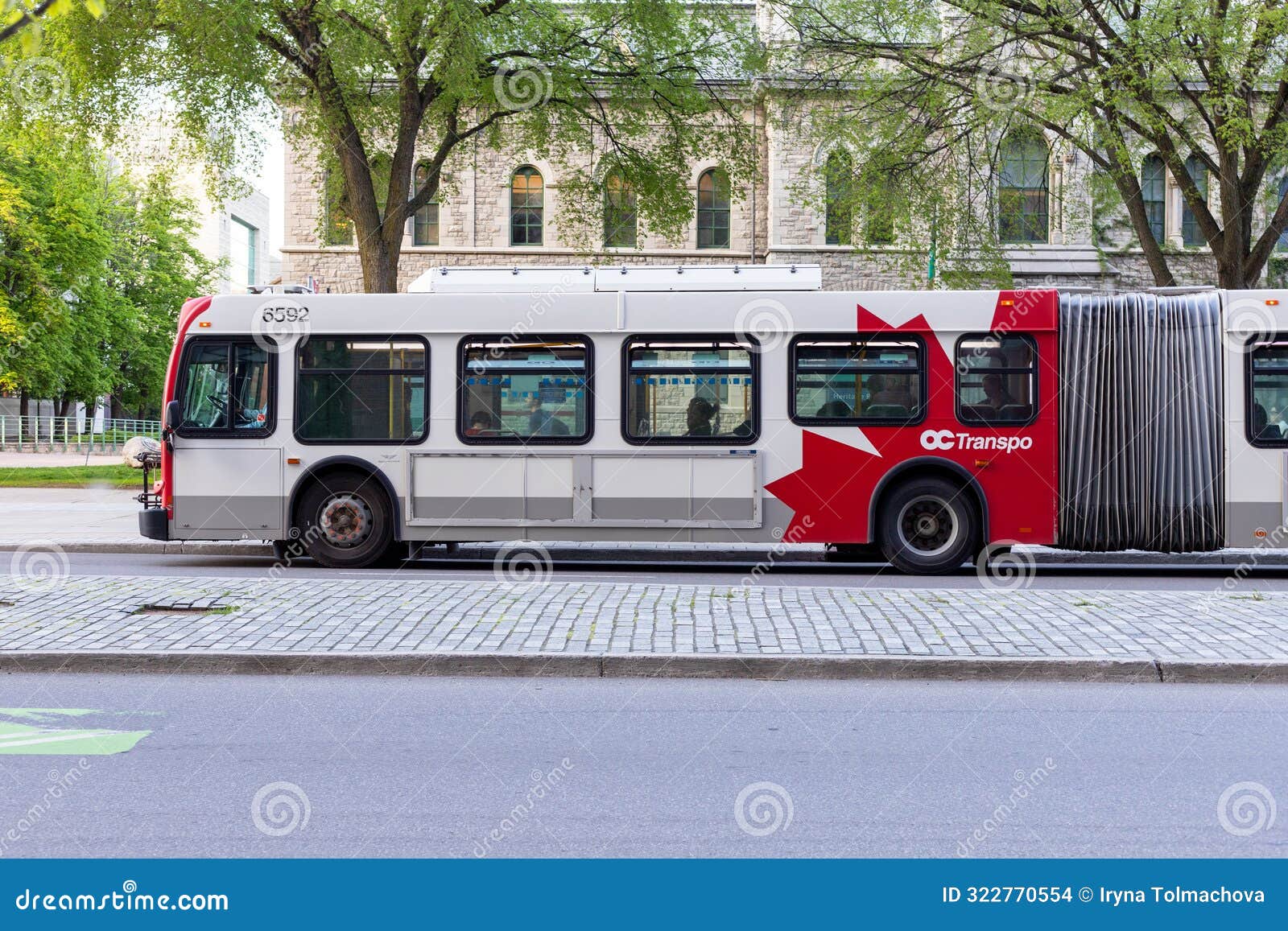 Public Bus on the Road in Downtown Ottawa. OC Transpo - Ottawa, Canada ...