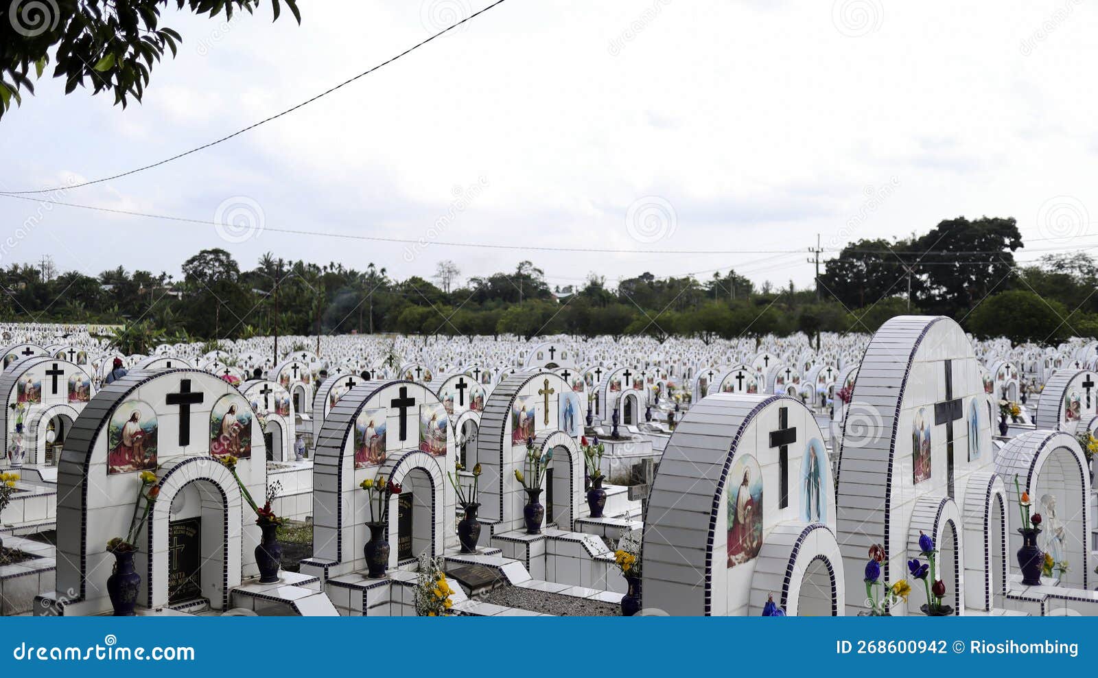 The Public Cemetery Contains Identical White Ceramic Graves with ...