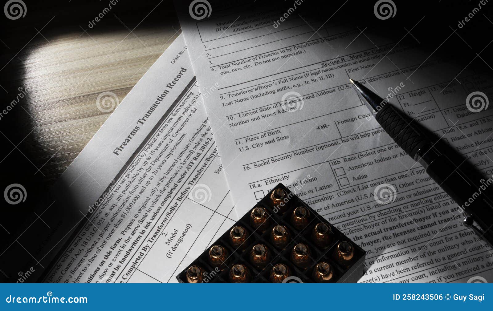 Public Domain Fbi Nics Background Check Form With Ammo And Pen On A