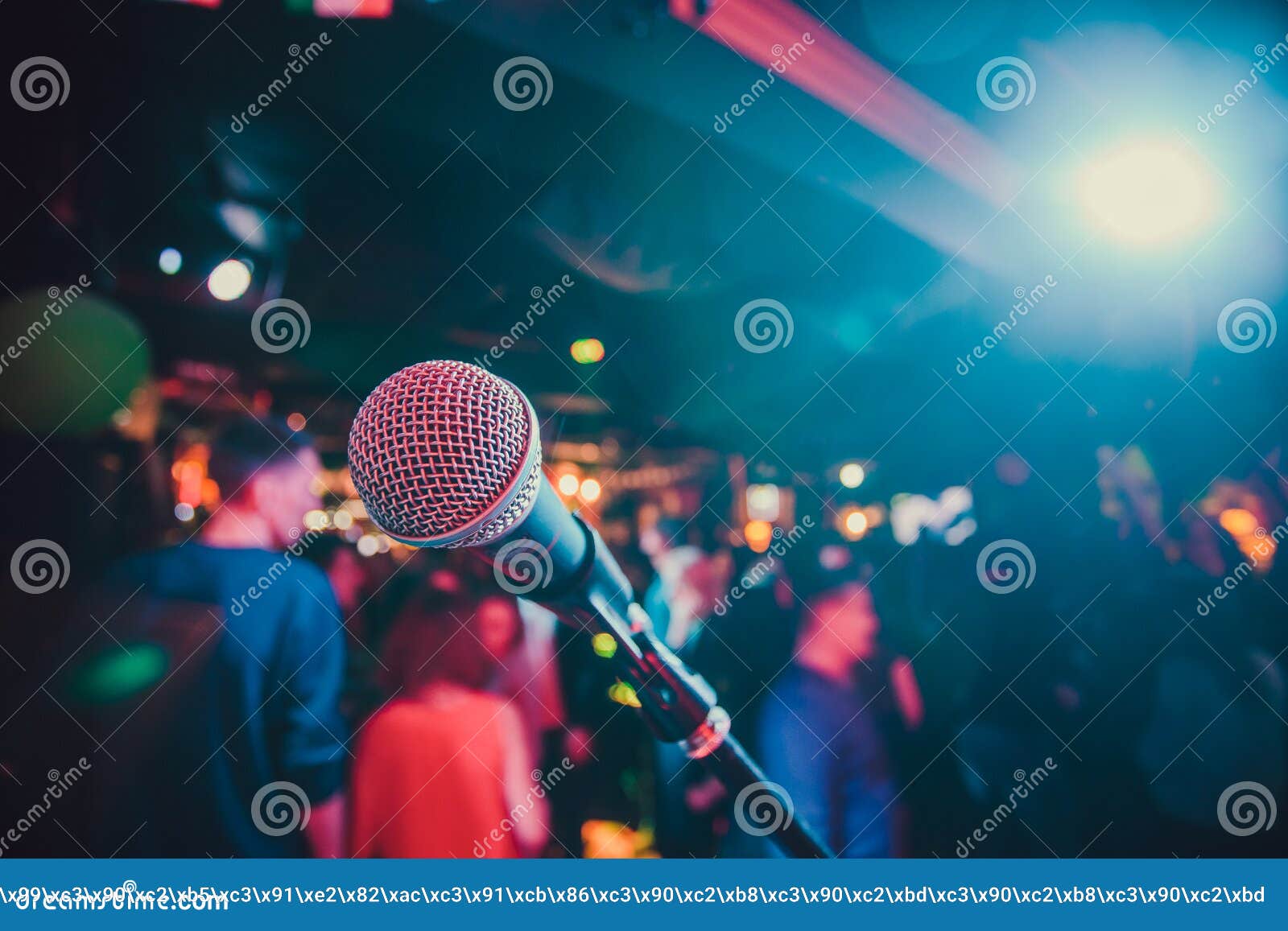 Public Performance on Stage Microphone on Stage Against a Background of ...
