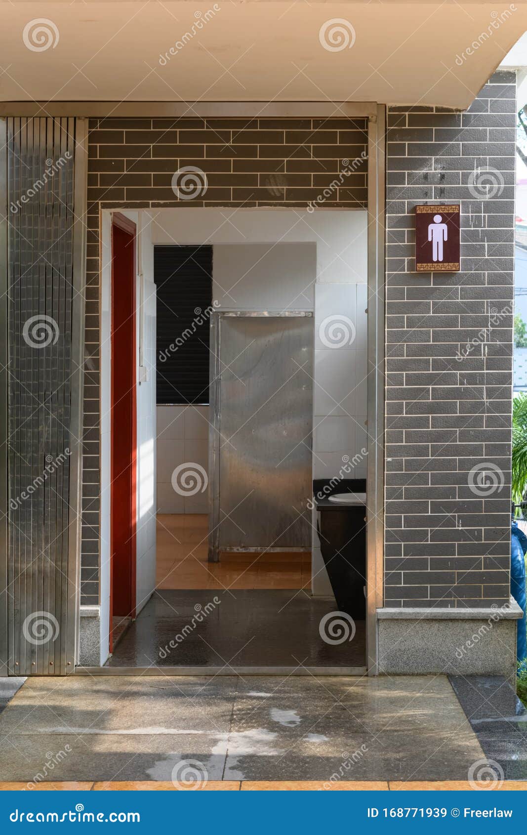 A public restroom for men stock image. Image of hygiene - 168771939