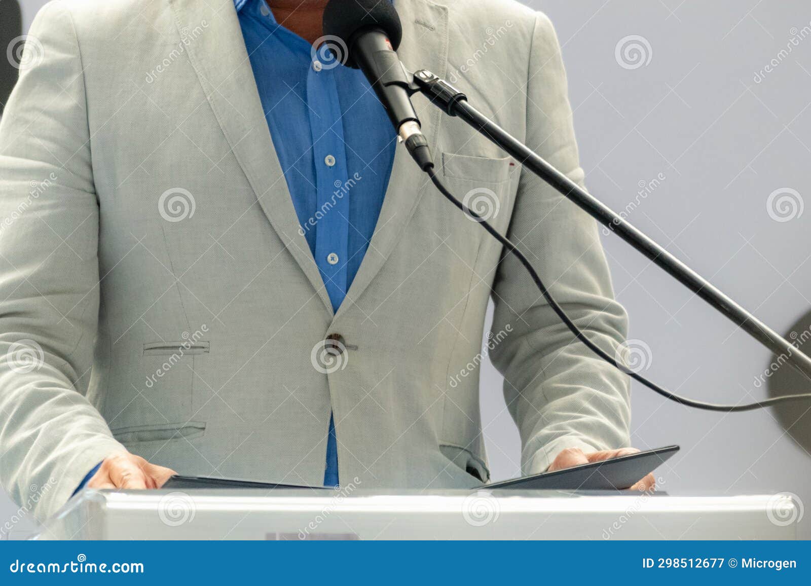 Public Speaker Captivates the Audience from the Stage, Sharing ...