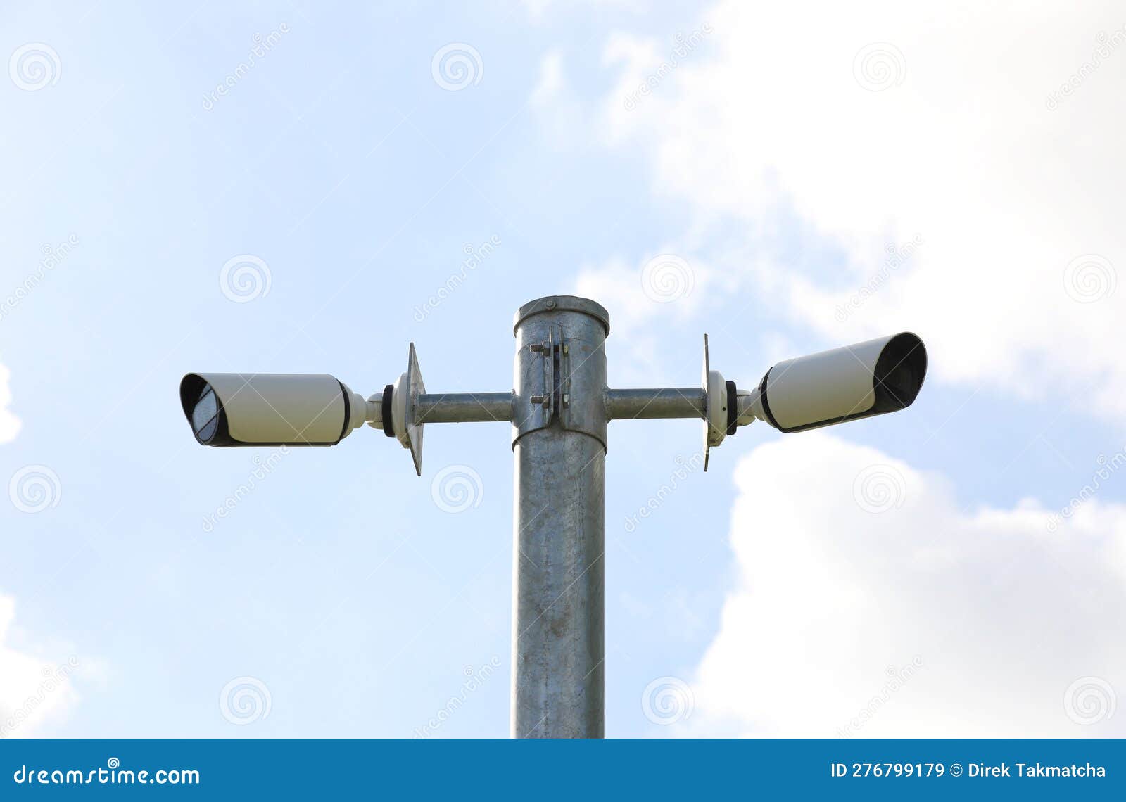 A Public Surveillance Camera Installed On A Lamp Post Against A Light ...