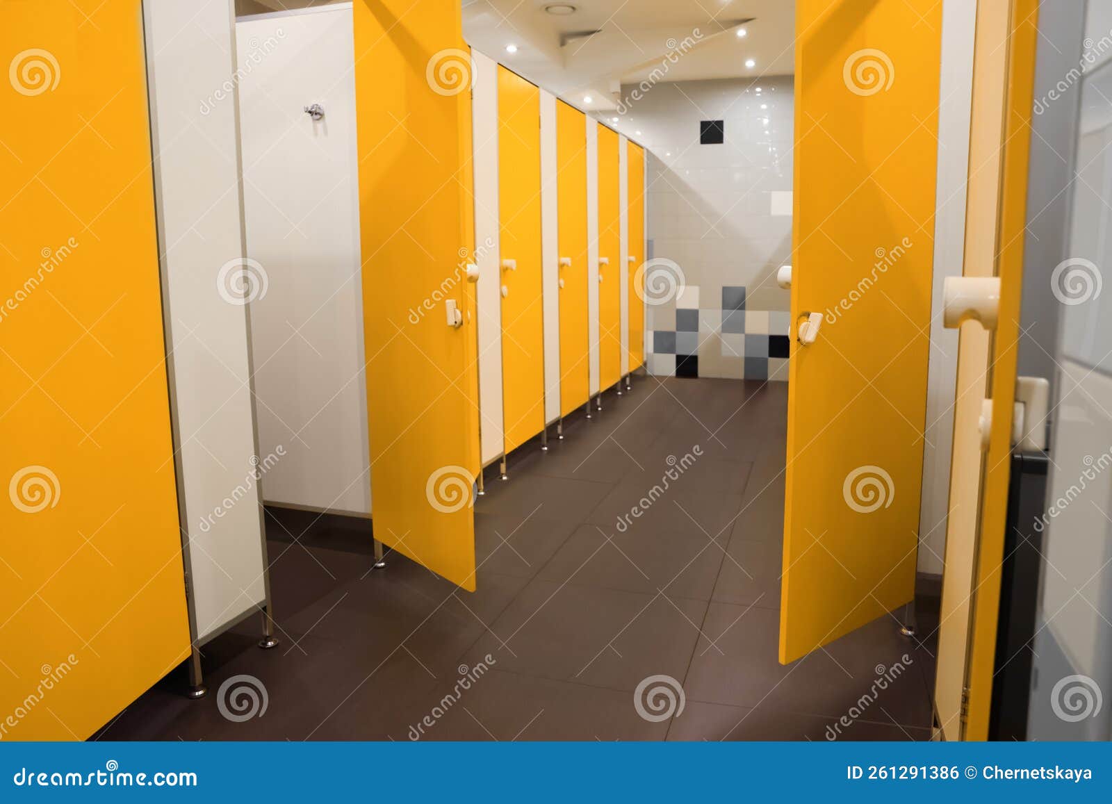 Public Toilet Interior with Bright Yellow Stalls Stock Photo - Image of ...