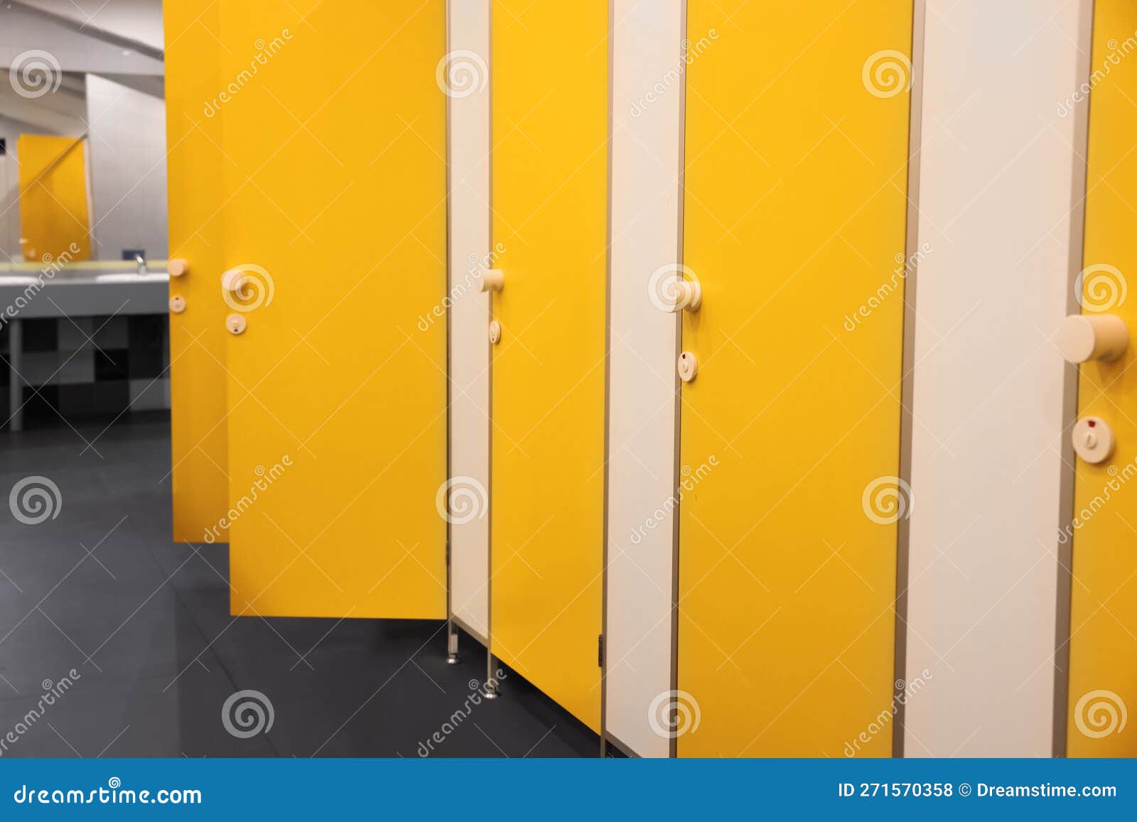Public Toilet Interior with Bright Yellow Stalls Stock Photo - Image of ...