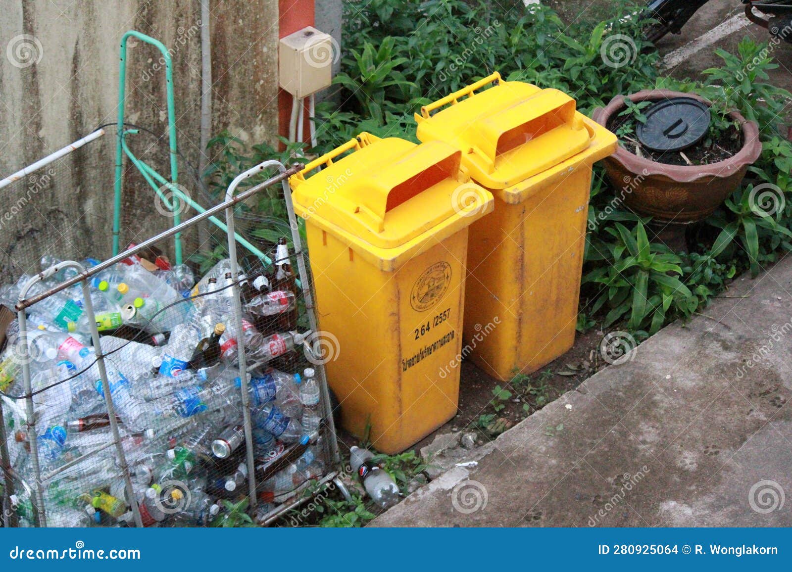 Public Yello Garbage Bins stock photo. Image of waste - 280925064