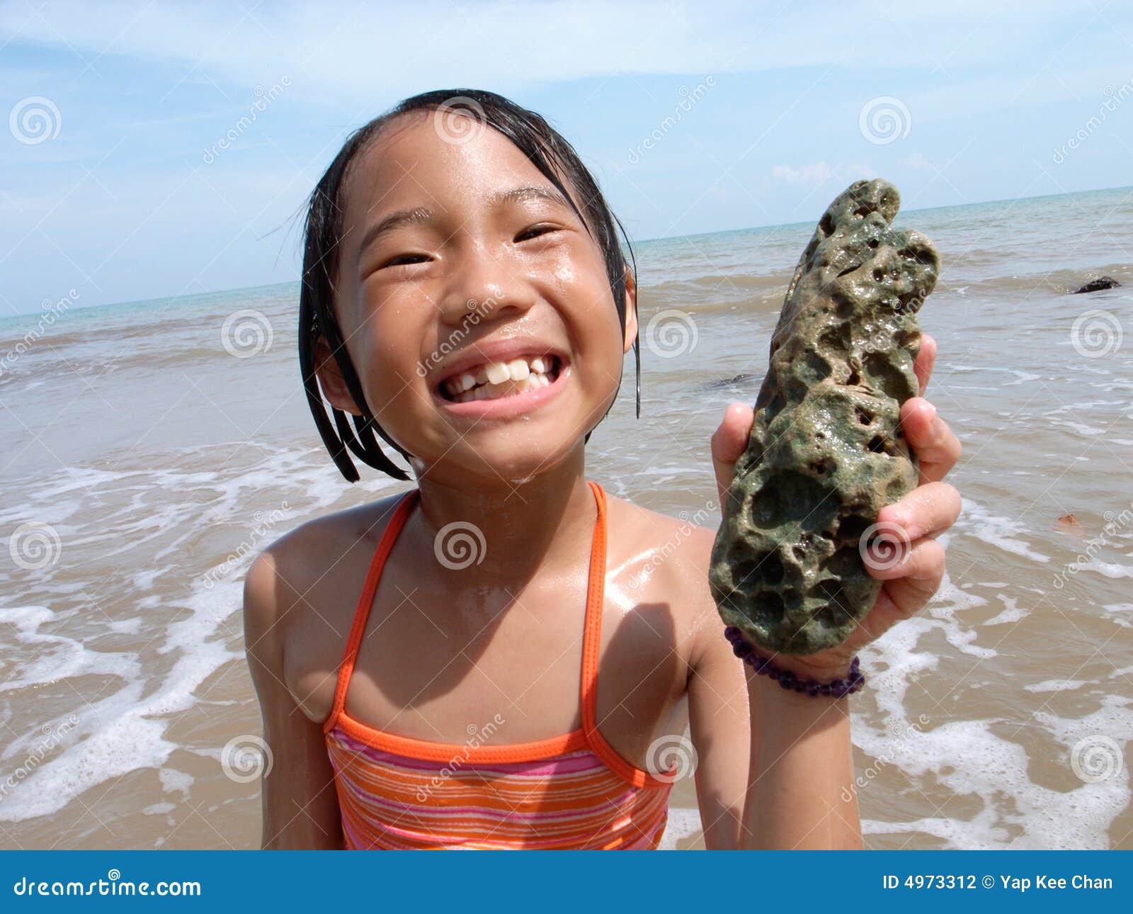 Puckish girl stock photo. Image of holiday, child, swimwear - 4973312