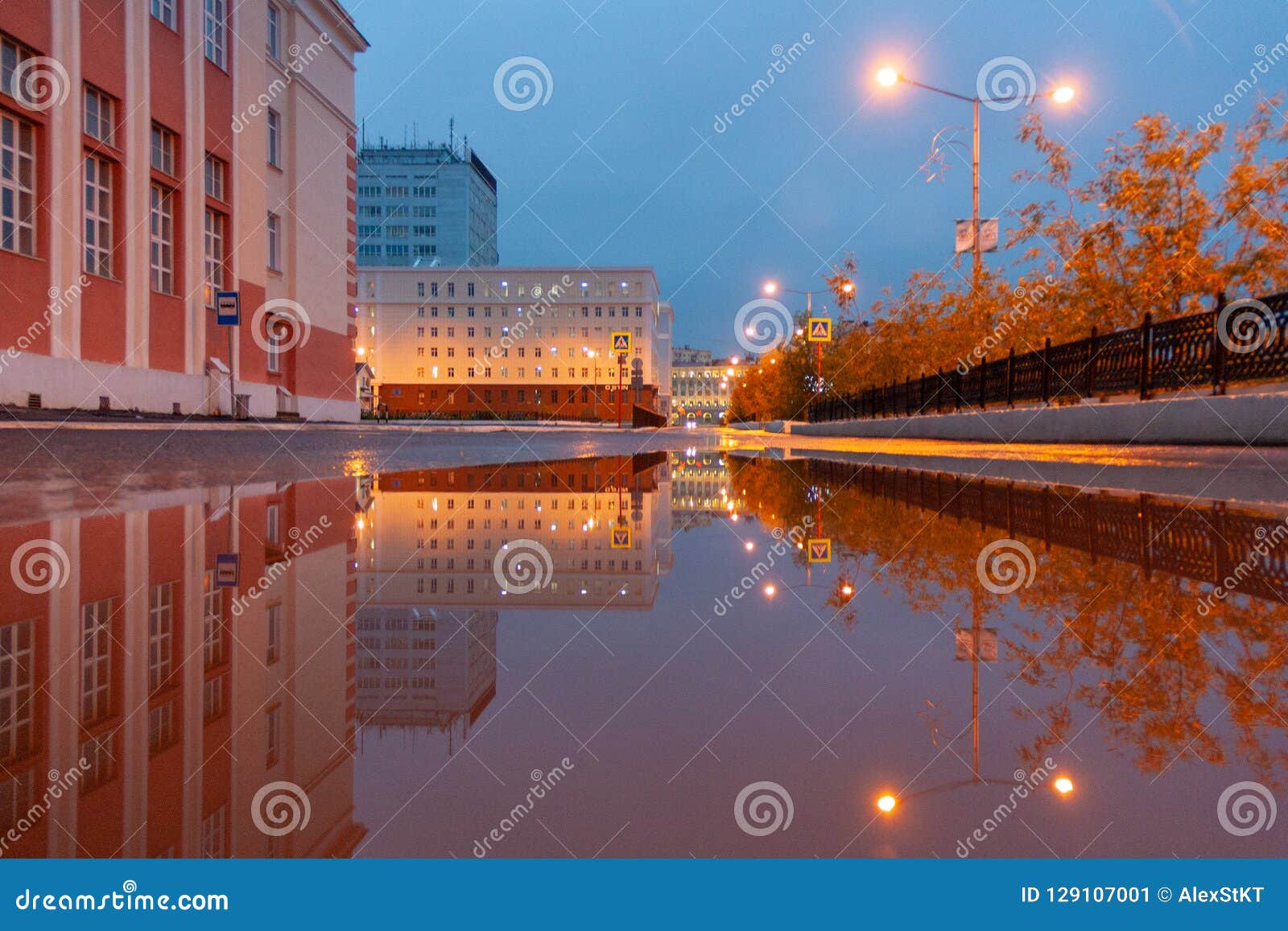 Puddle City Reflection, Norilsk Stock Image - Image of center, bricks ...