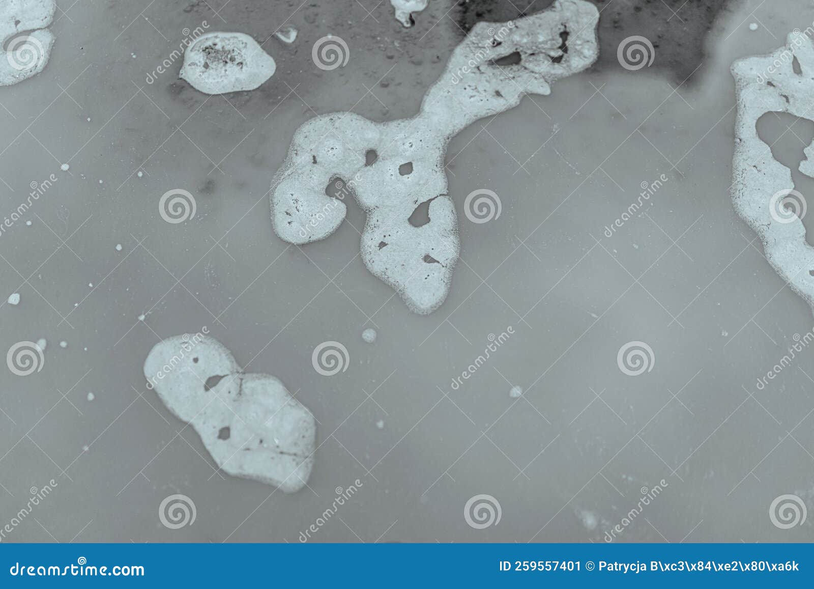 Puddle, Foam, Structure Under Water. Reflecting the Sky. Stock ...