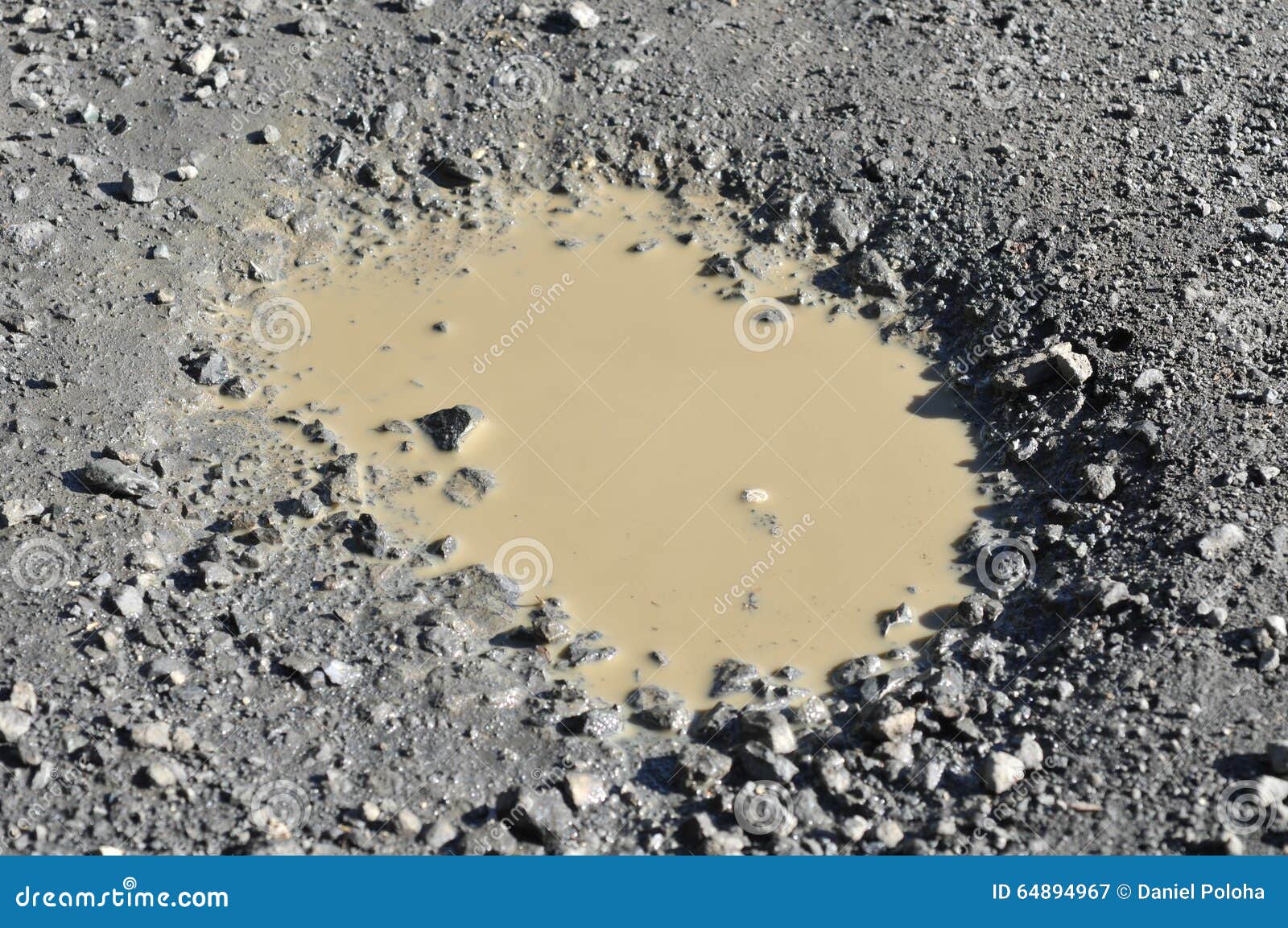Puddle stock image. Image of unsealed, surface, puddle - 64894967