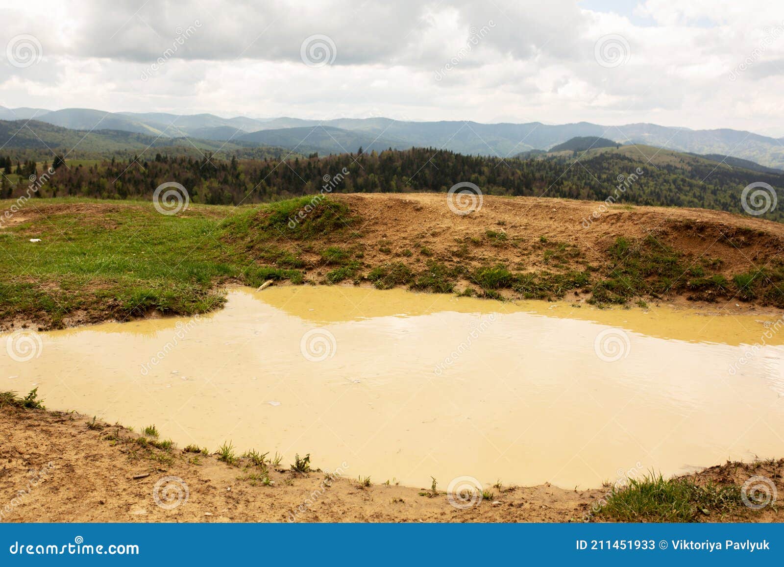 Puddle after Rain in Clay Soil in the Mountains Stock Image - Image of ...