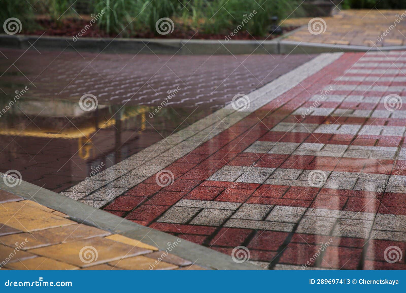 Puddle after Rain on Street Tiles Outdoors Stock Image - Image of ...
