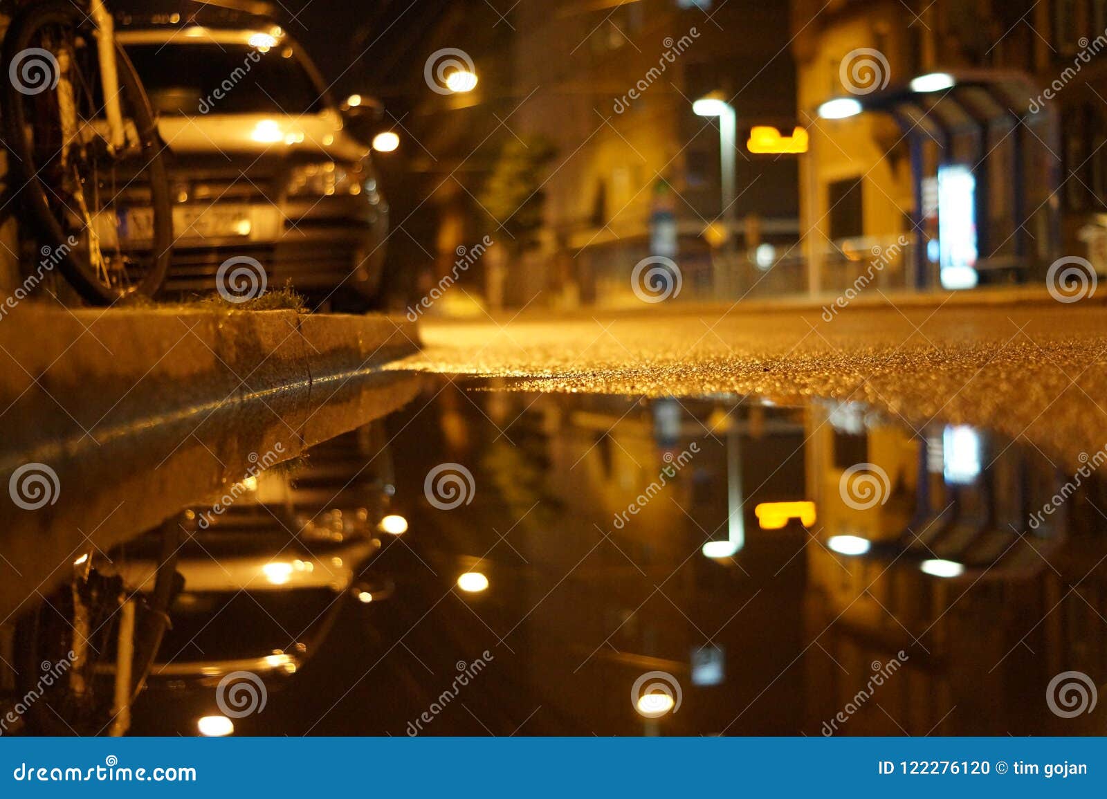 Puddle Reflection at night stock photo. Image of scene - 122276120