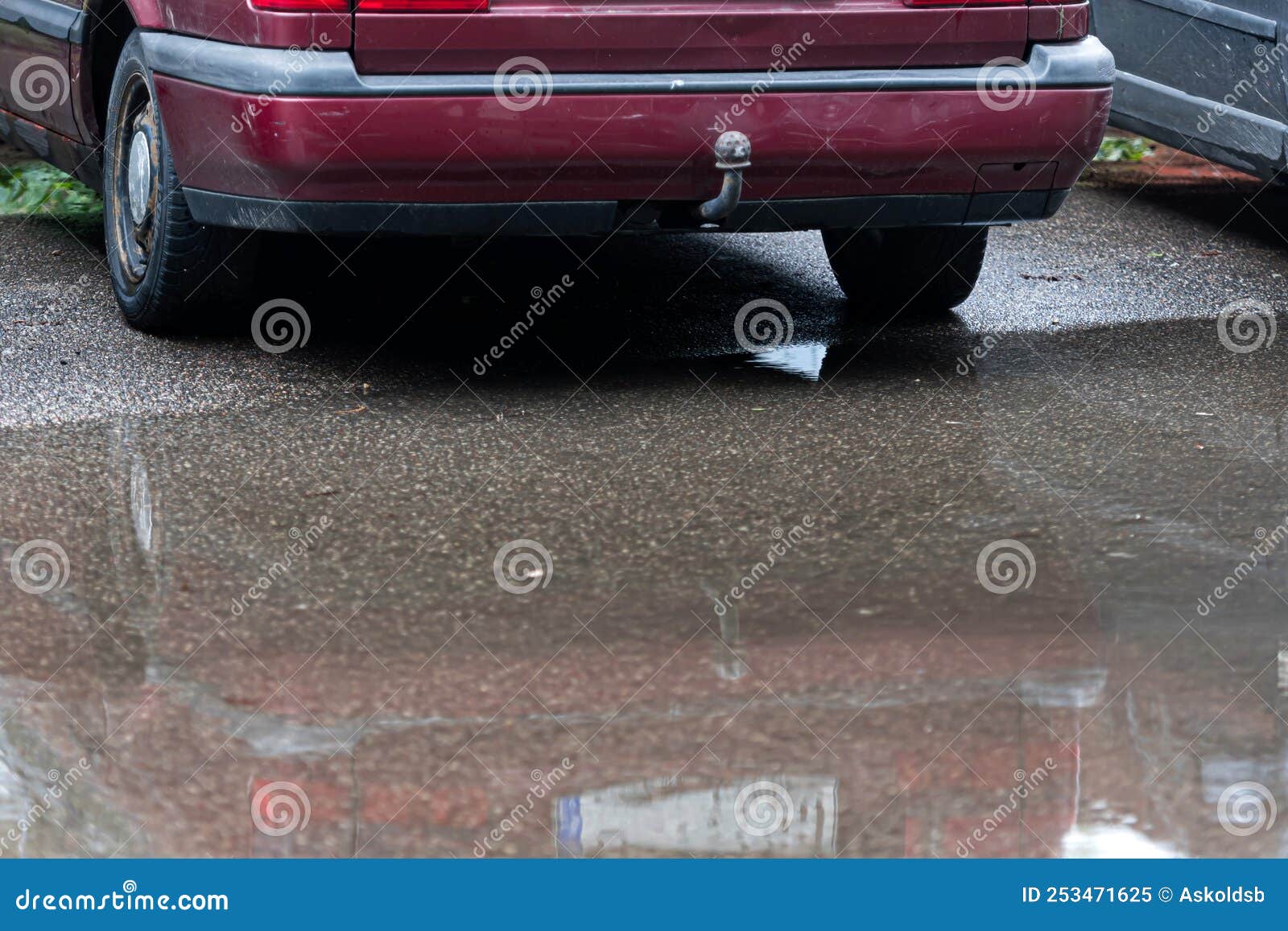 Puddle on the Sidewalk with a Reflection of a Parked Car, Closeup, Road ...