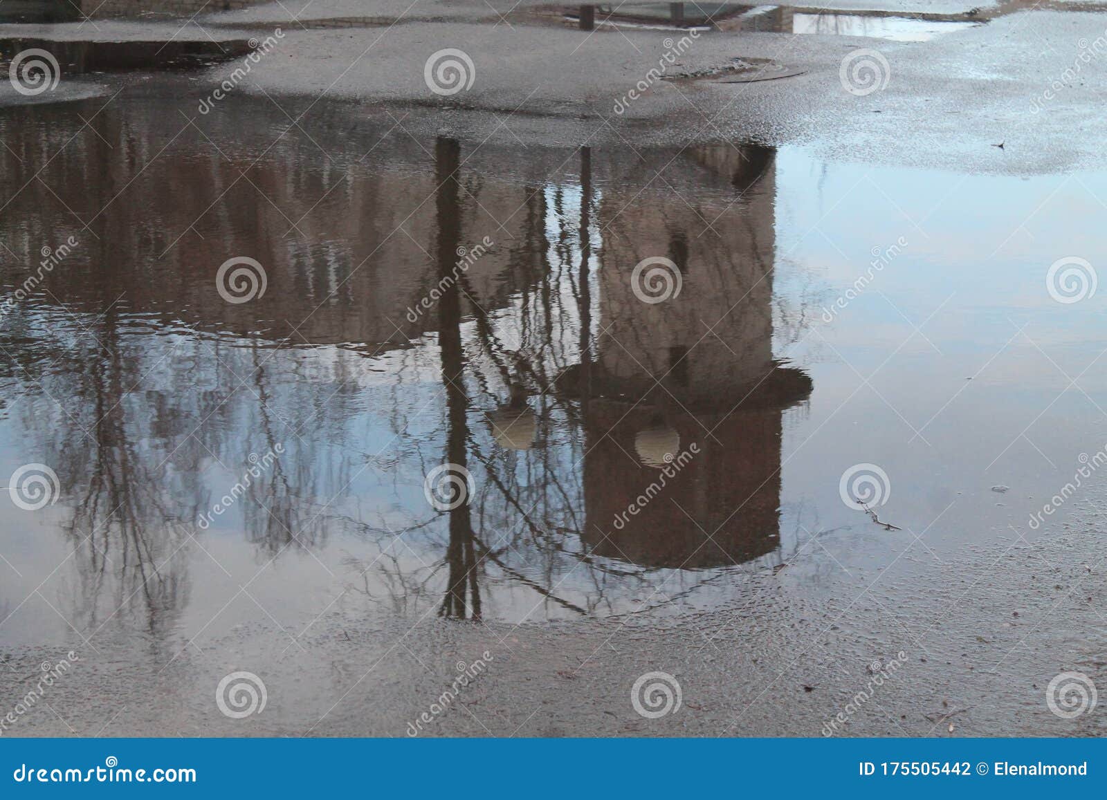 Puddle after spring rain stock photo. Image of lantern - 175505442