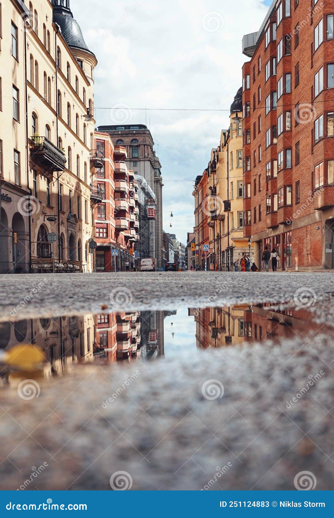 Puddle on Street in City during Summer Editorial Stock Photo - Image of ...
