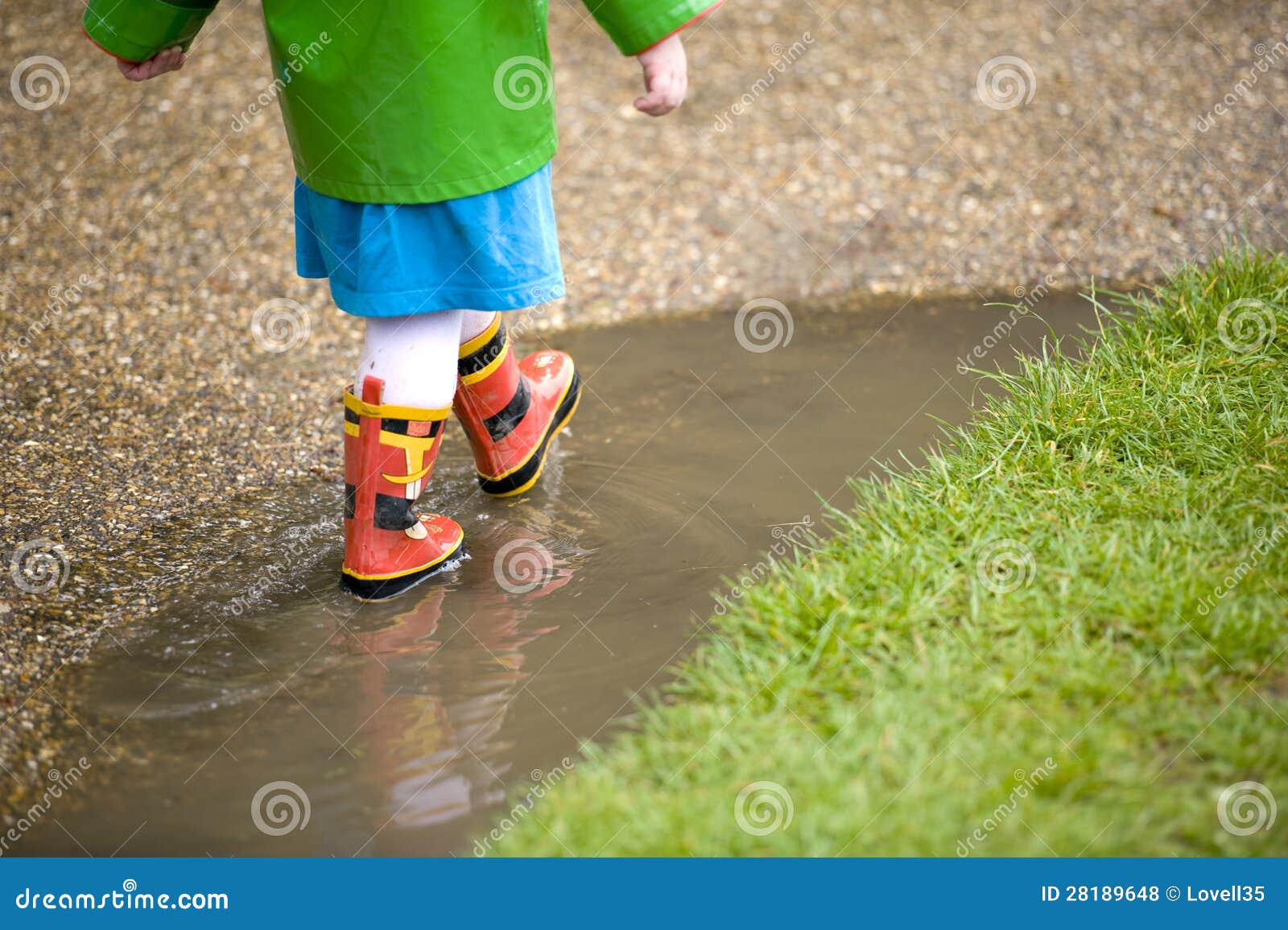 Puddle walking stock photo. Image of colourful, puddle - 28189648