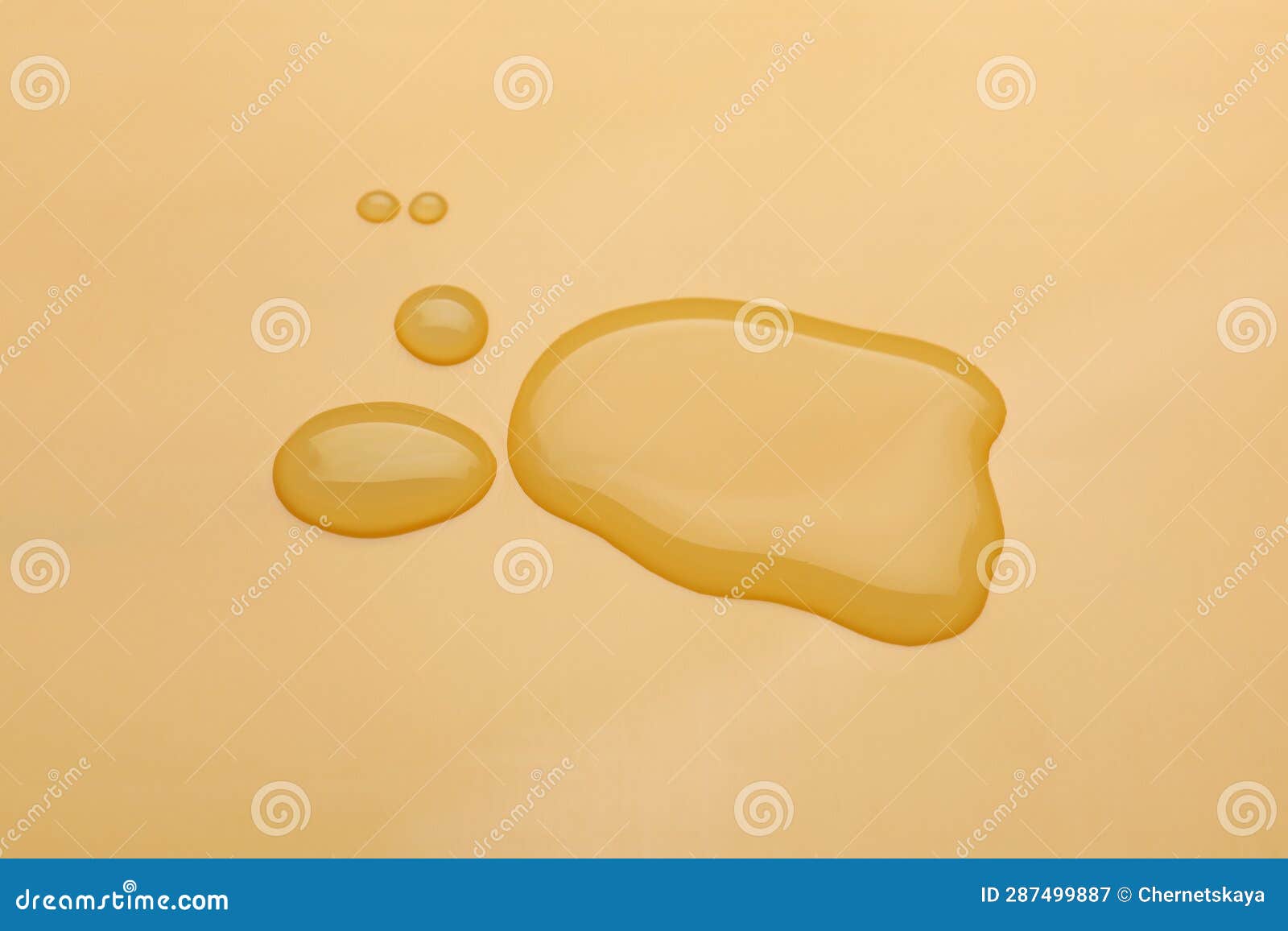 Puddle of Water on Pale Orange Background Stock Image - Image of ...