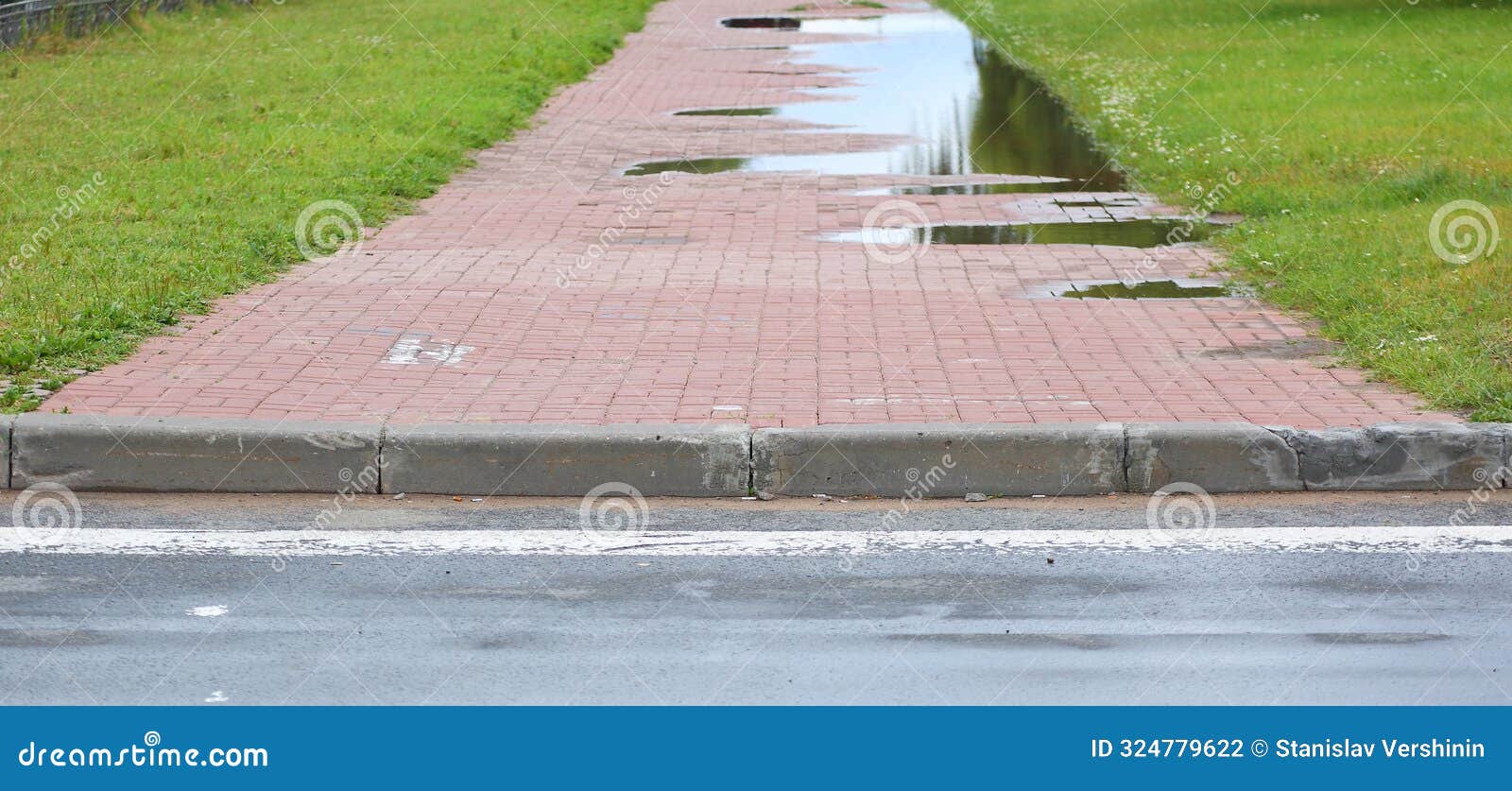 Puddles after Heavy Rain on the Footpath Stock Photo - Image of rain ...
