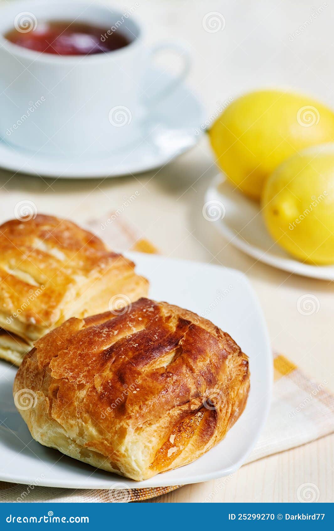 Puff buns, lemons and tea stock photo. Image of lemon - 25299270
