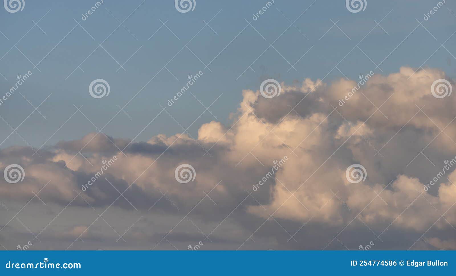 Puff Clouds in the Sky during Sunset. Stock Photo - Image of blue ...