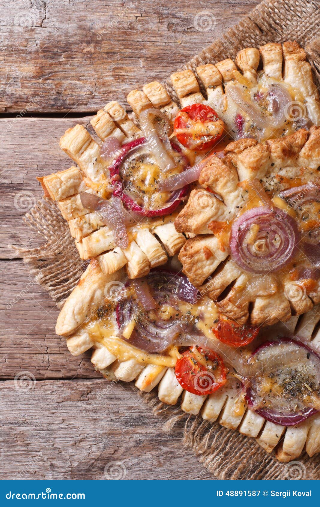 Puff Pastry Pies with Red Onions and Tomatoes Vertical Top View Stock ...