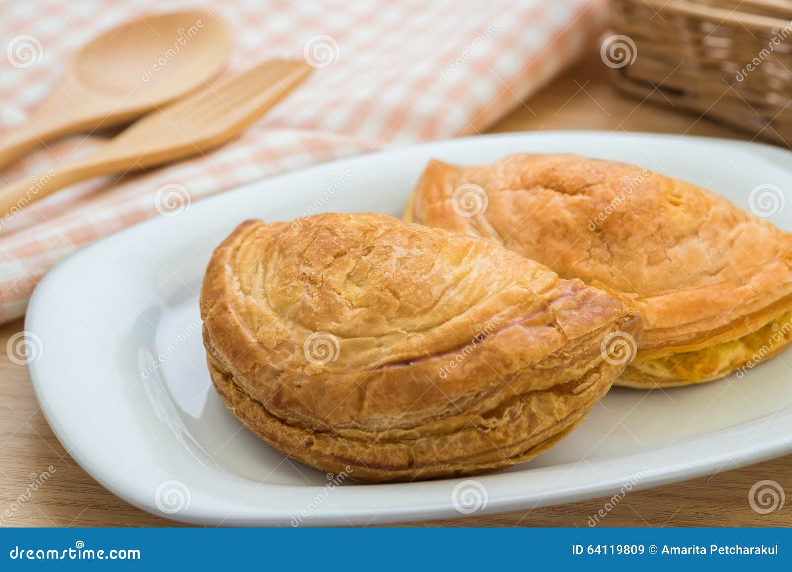 Puff pastry on plate stock image. Image of spoon, plate - 64119809