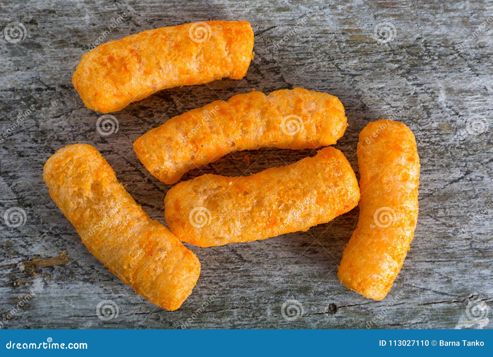 Puffed corn snacks closeup stock photo. Image of yellow - 113027110