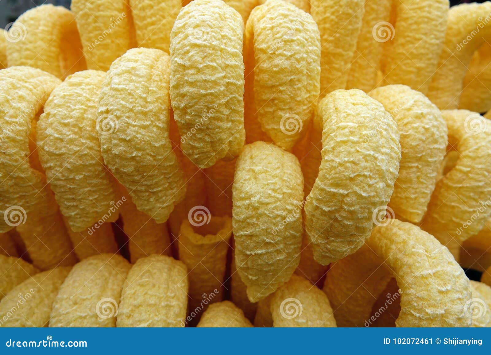 Puffed food stock image. Image of ball, yellow, food - 102072461