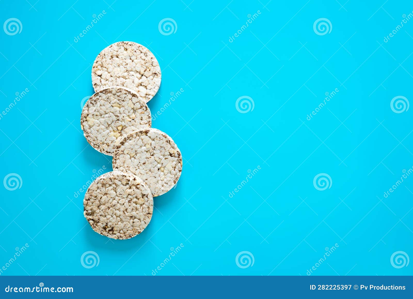 Puffed Rice Cakes on Blue Background, Flat Lay, Copy Space. Stock Image ...