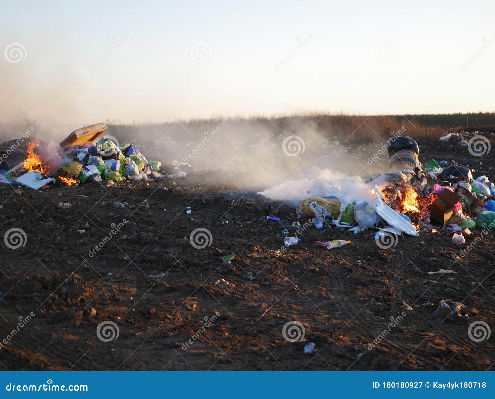 Puffs of Smoke from the Trash. Burning Garbage. Concern for the ...