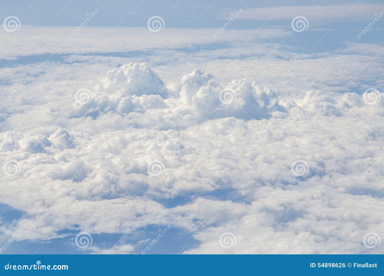 Puffy clouds and blue sky stock photo. Image of outdoors - 54898626