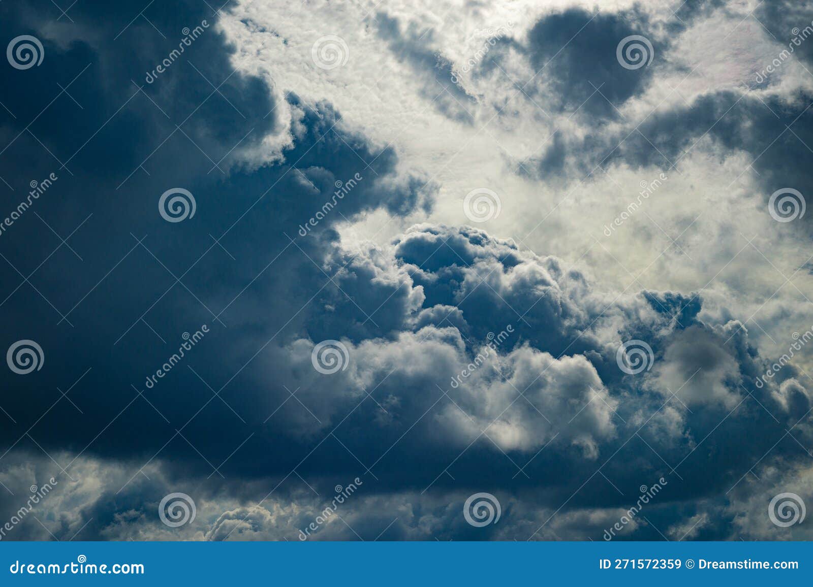 Puffy Dark Cloudscape Backlit with High Contrast Stock Image - Image of ...